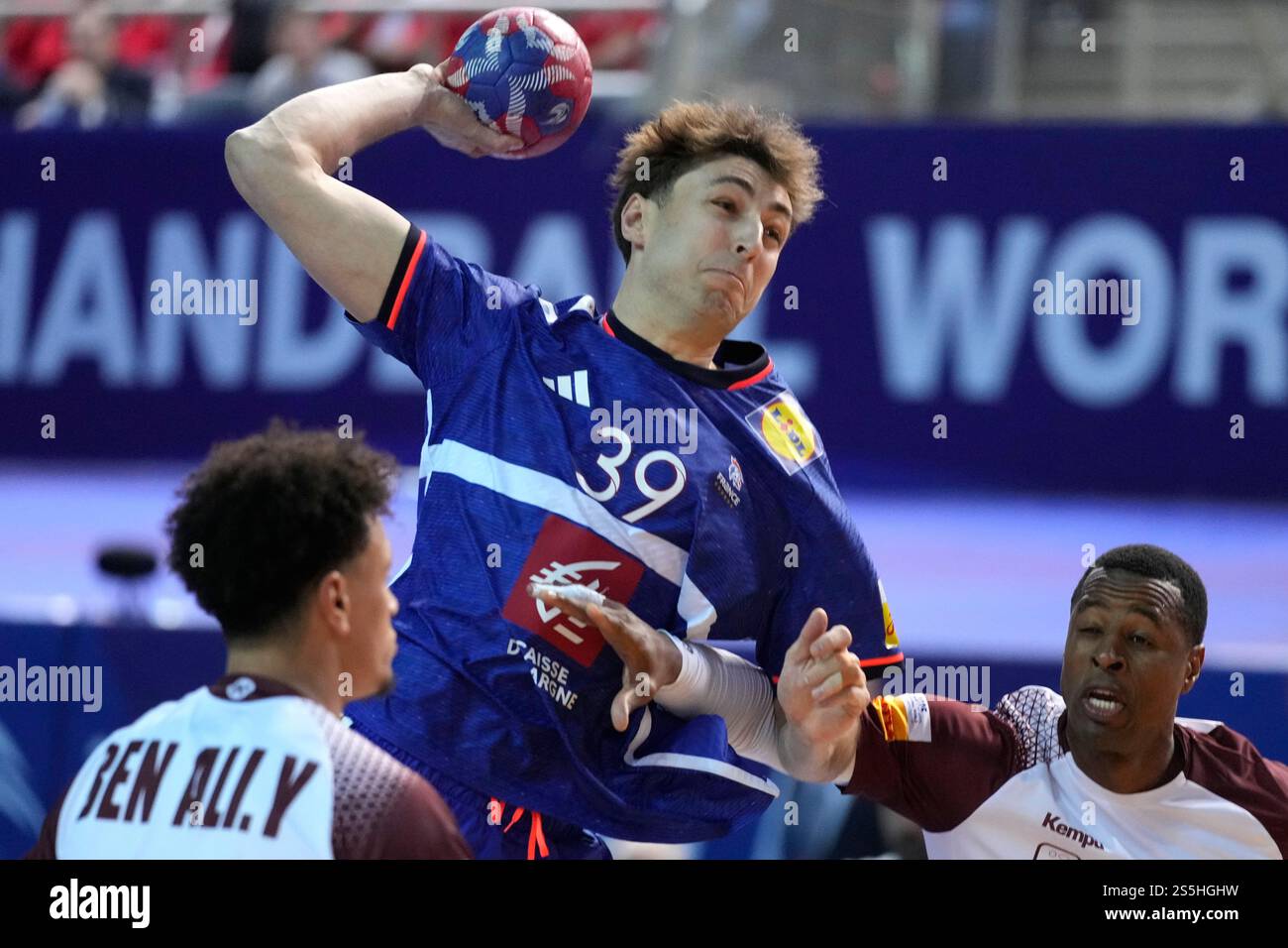 France's Thibaud Briet makes a shot during the preliminary round group ...