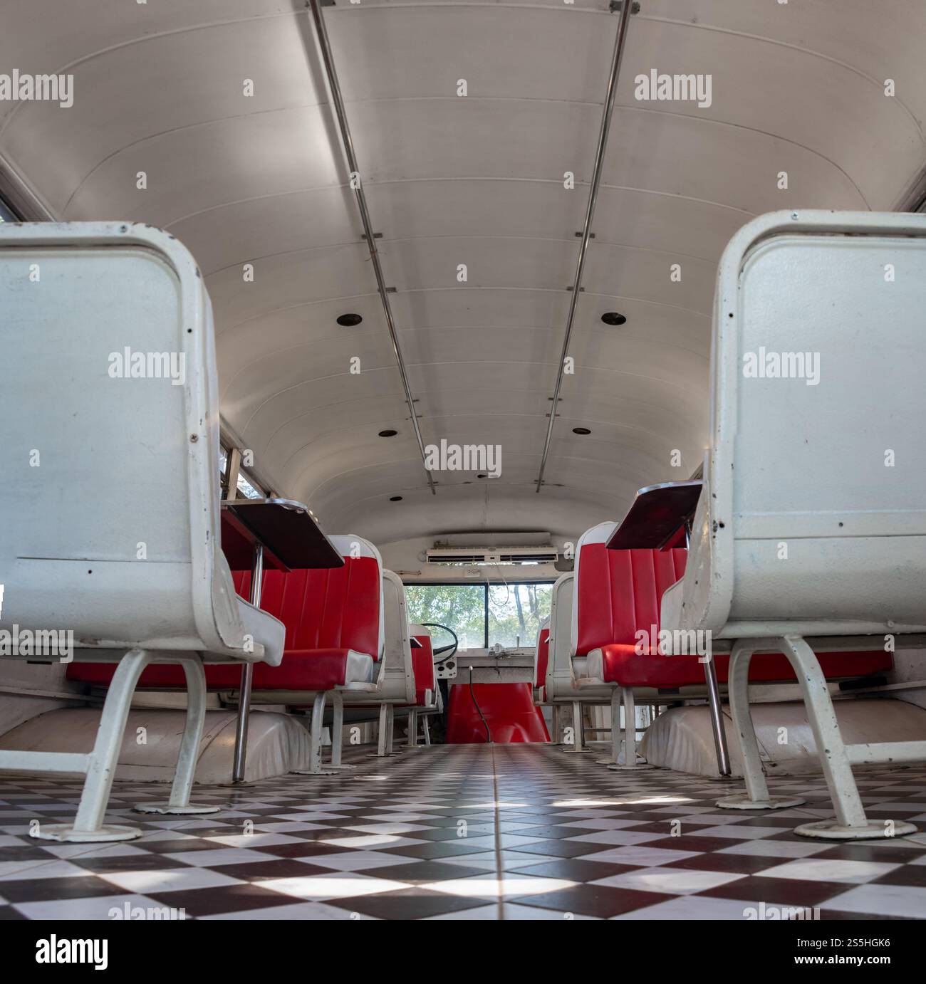 Interior of an old bus with benches and tables Stock Photo - Alamy