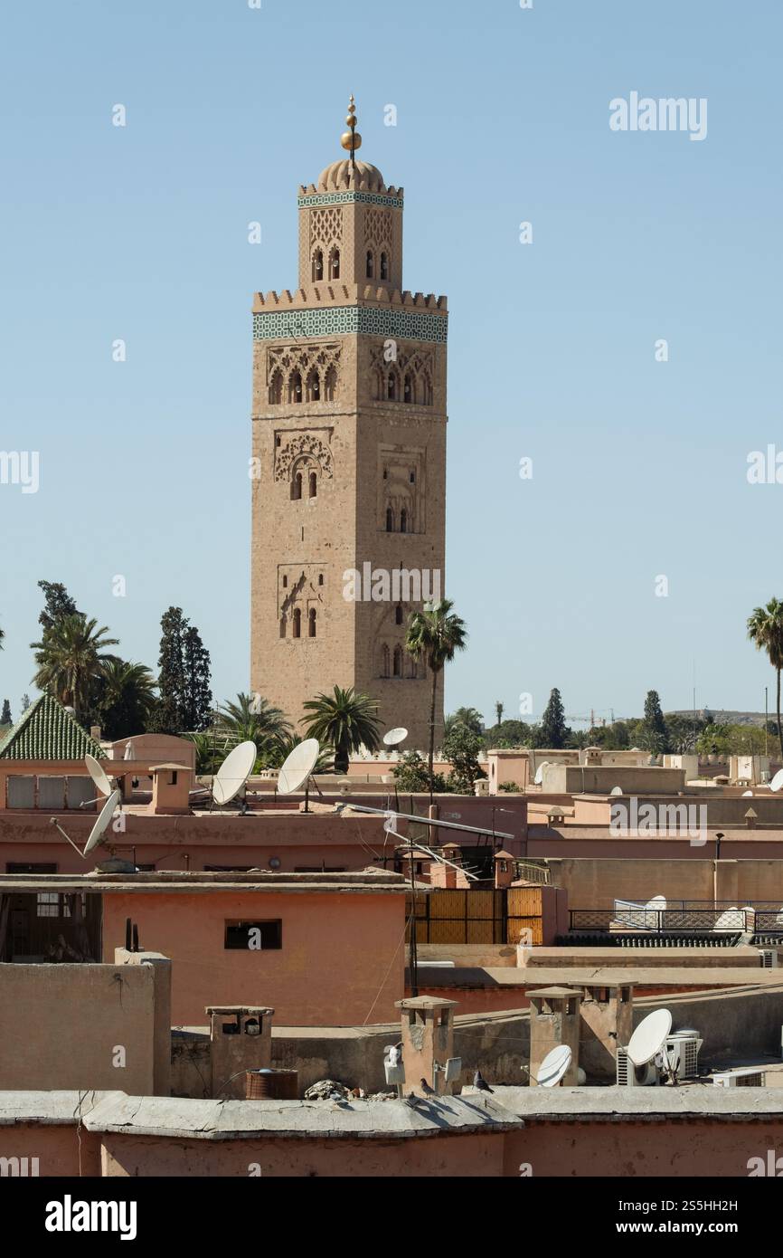 Mosque above the roofs of the city of Marrakech in Morocco Stock Photo ...