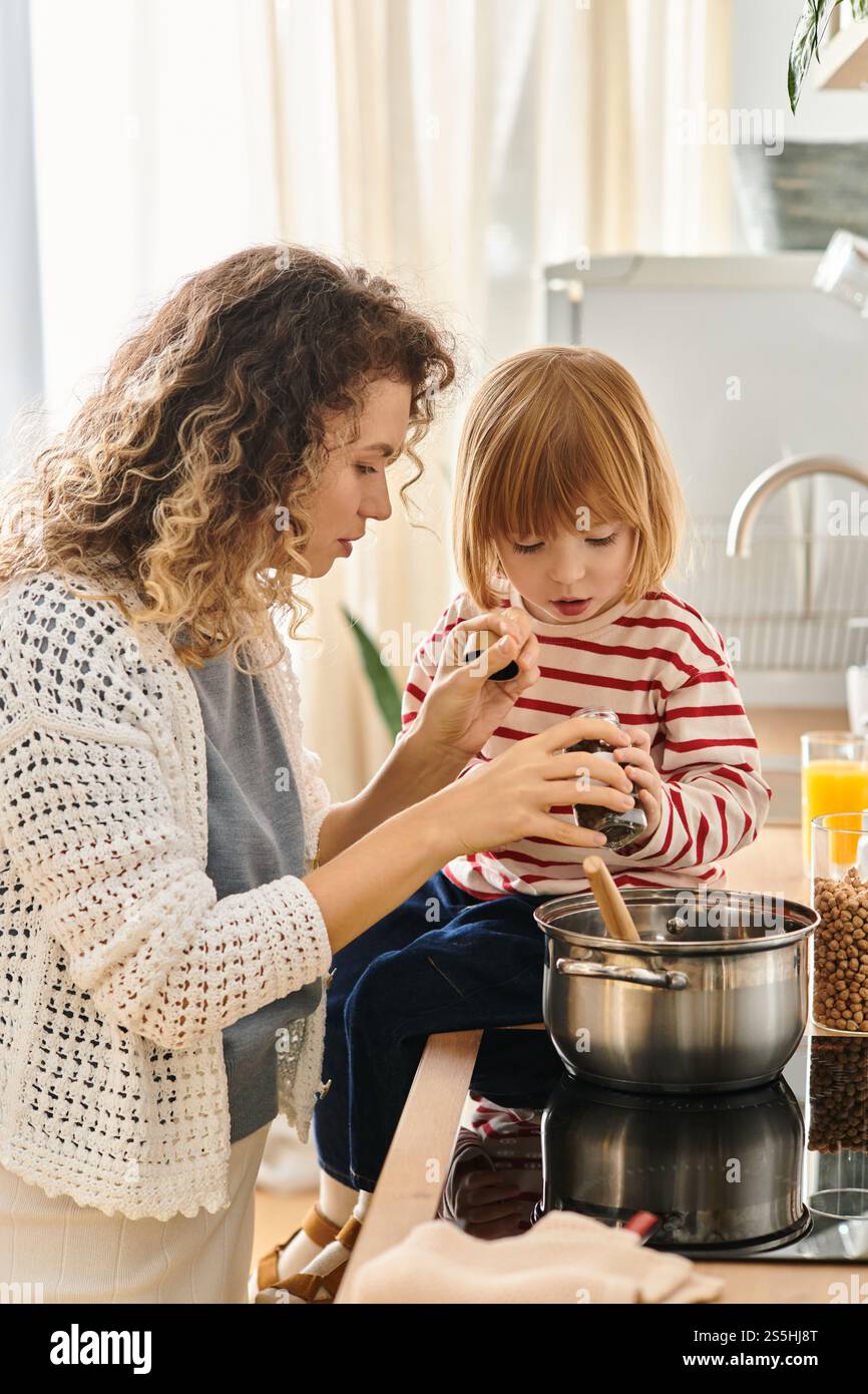 A mother and daughter share a delightful moment cooking together at ...