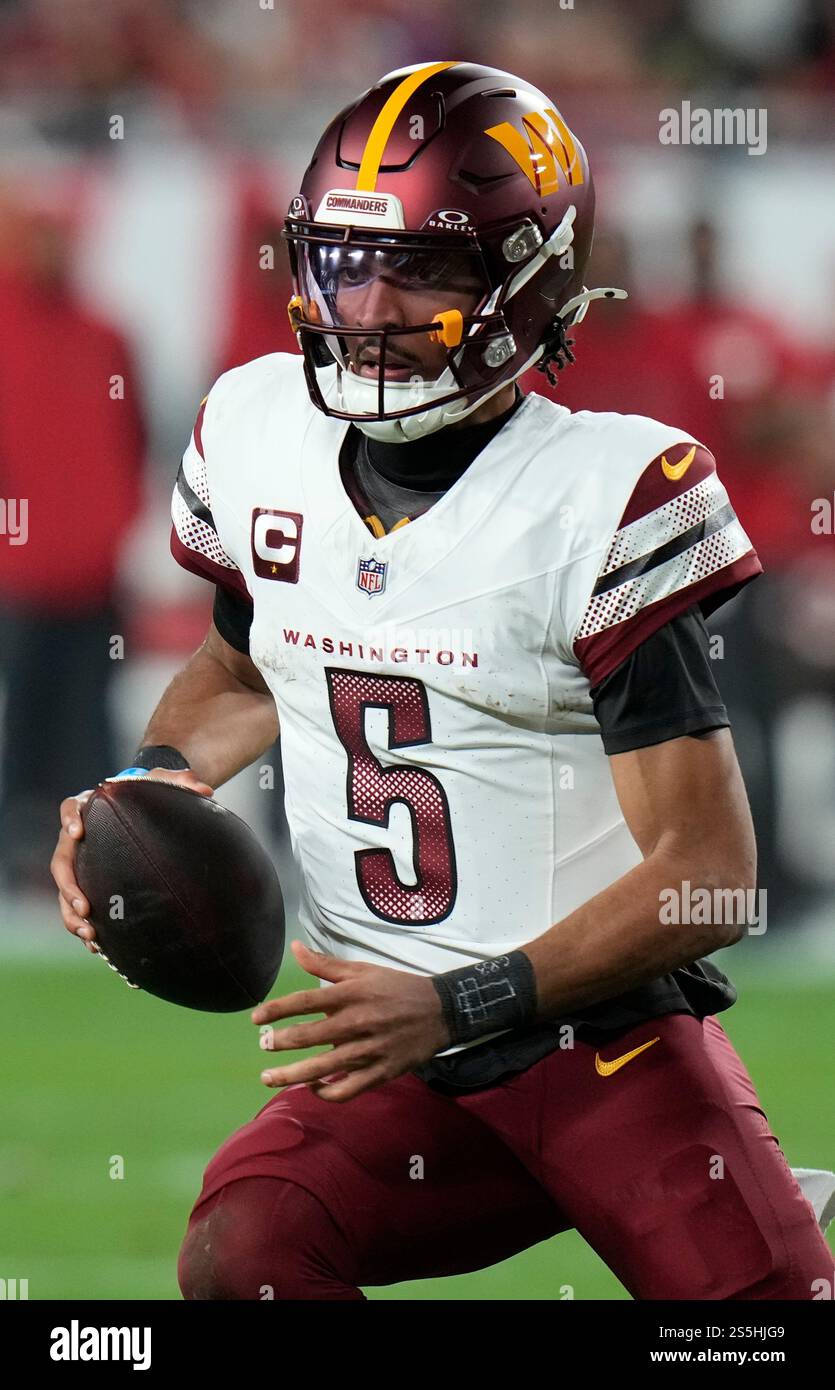 Washington Commanders quarterback Jayden Daniels (5) against the Tampa Bay Buccaneers during an ...