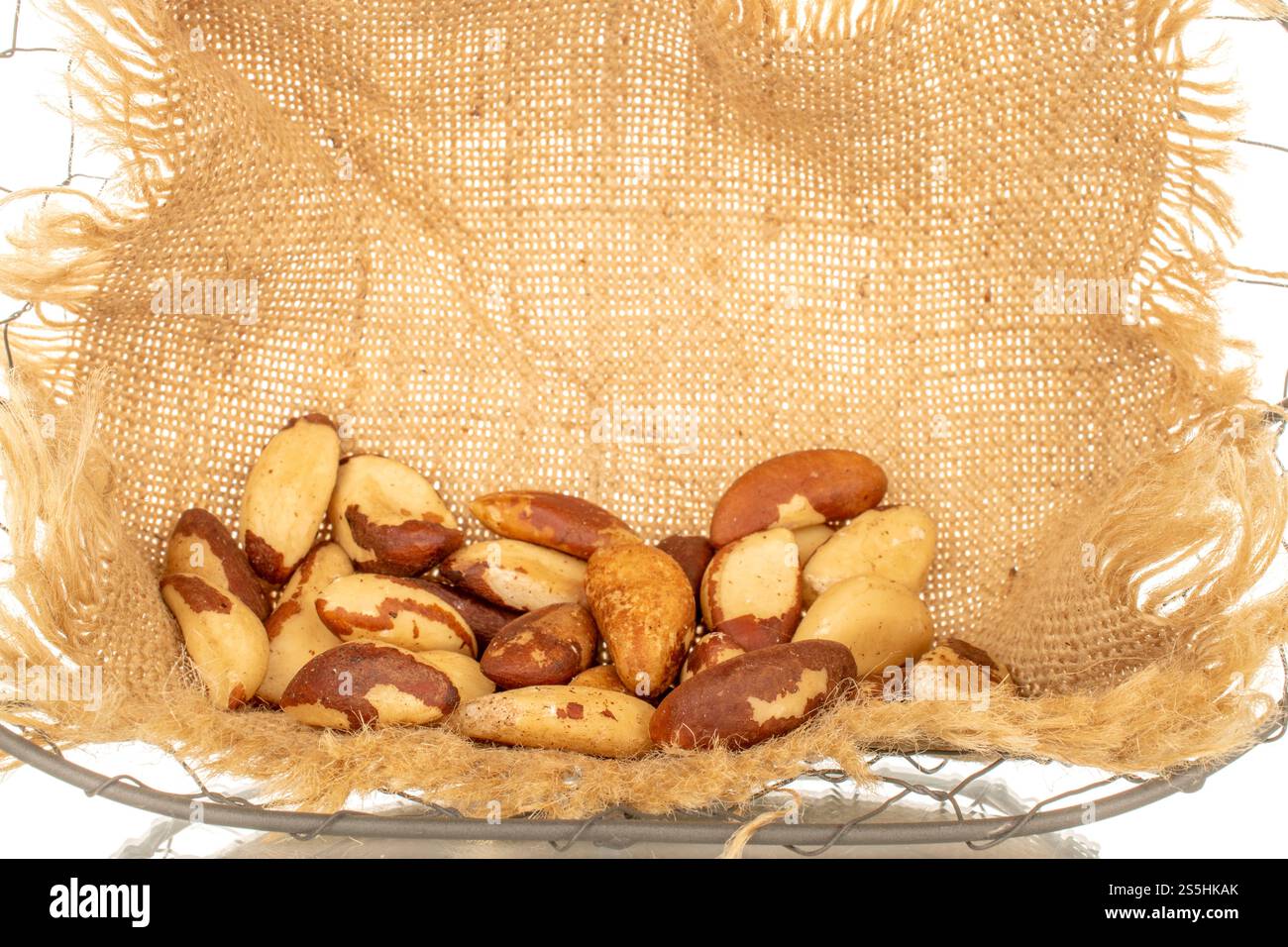 Brazil nuts without shells with jute napkin, close-up, isolated on ...