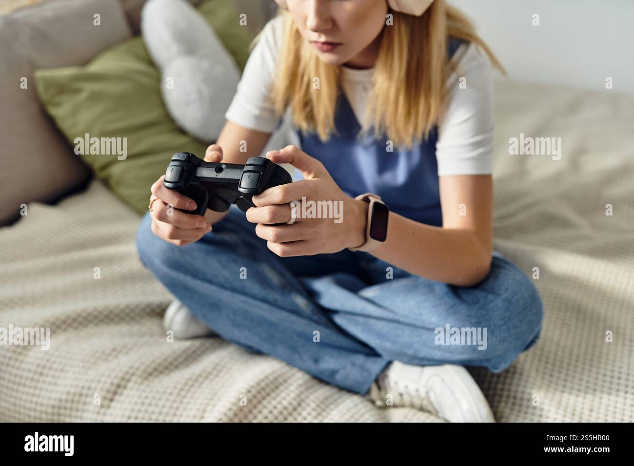 A teenage girl enjoys an immersive gaming experience in her modern ...