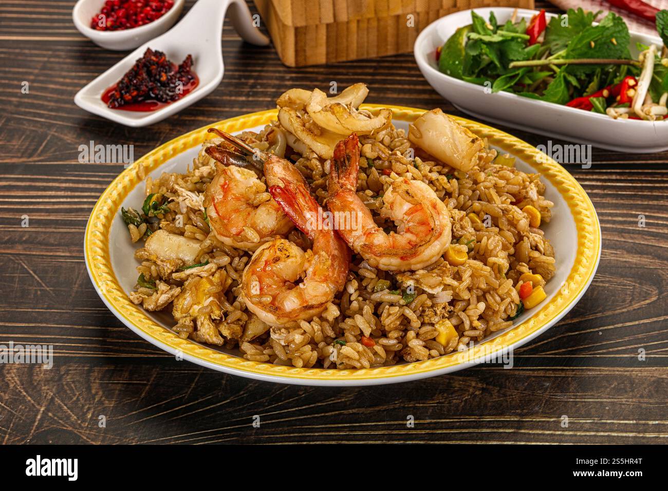 Vietnamese traditional fried rice with prawn and squid - Kom Ran Stock ...