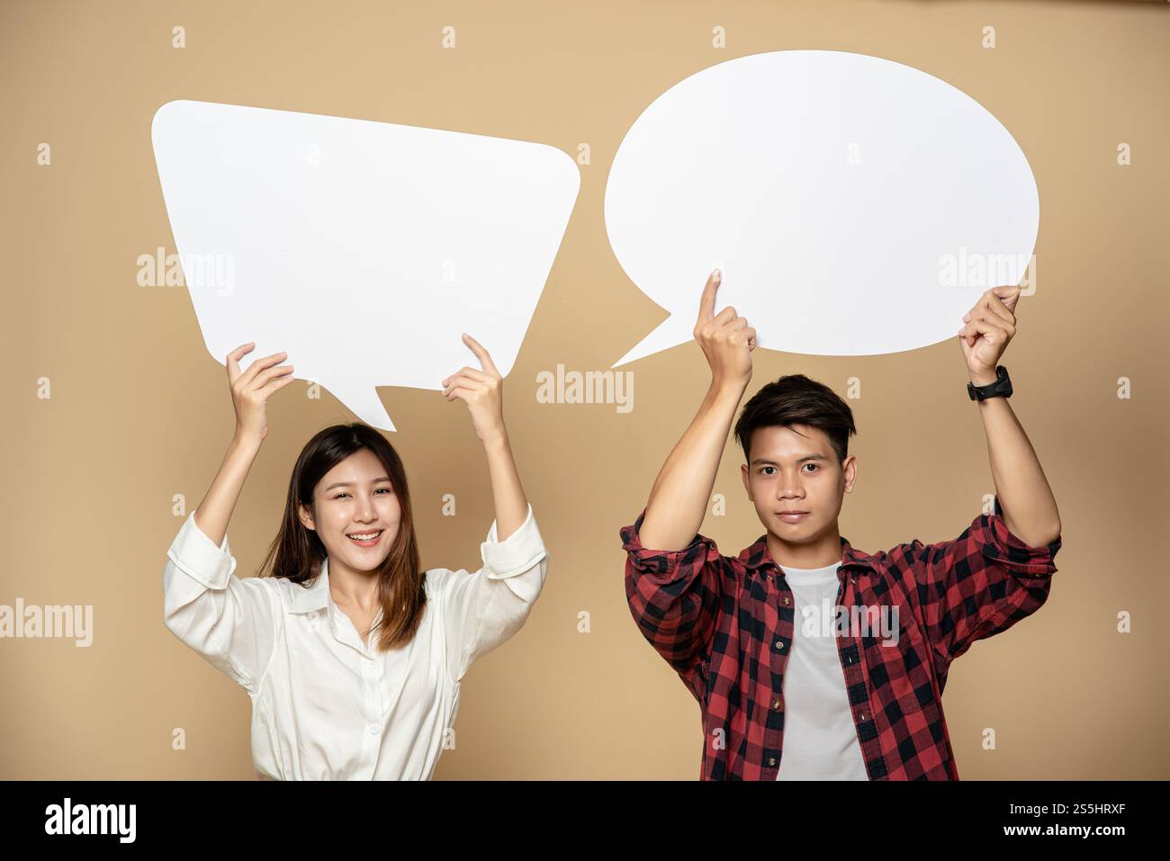 Men and women wearing shirts and hold a thought box symbol Stock Photo ...