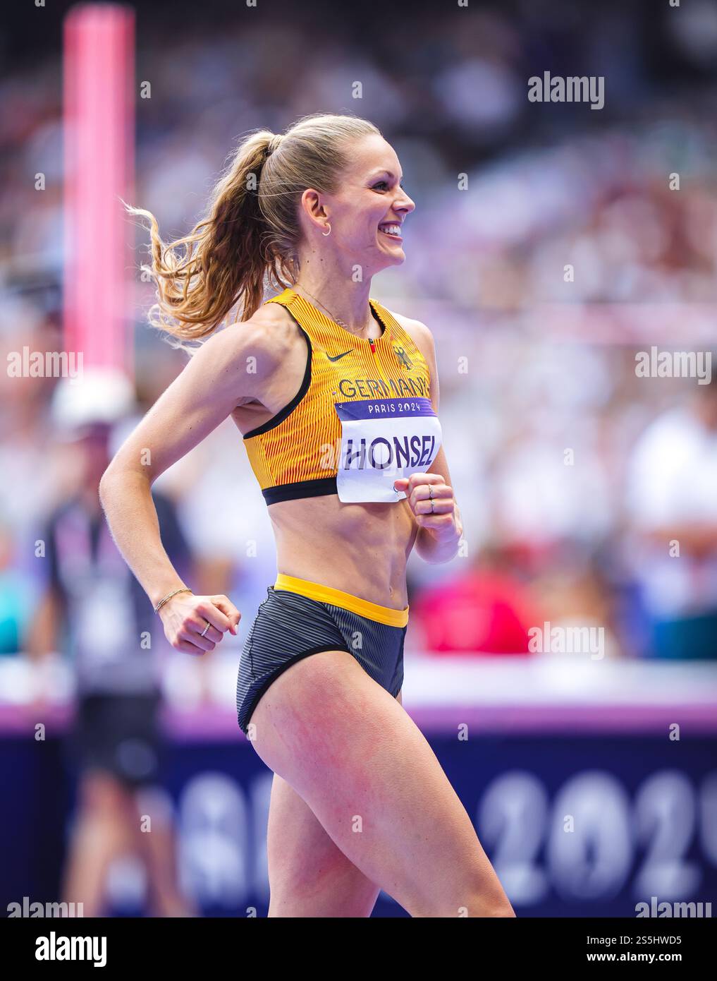 Christina Honsel participating in the high jump at the Paris 2024 ...