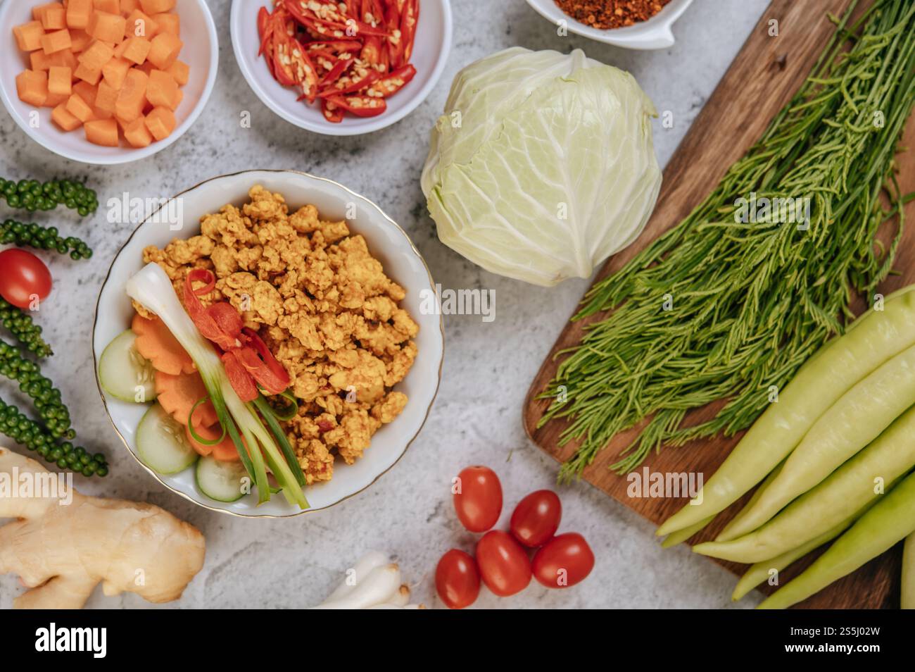 Fried Chicken Pop with Chili Scallions and tomatoes Stock Photo - Alamy