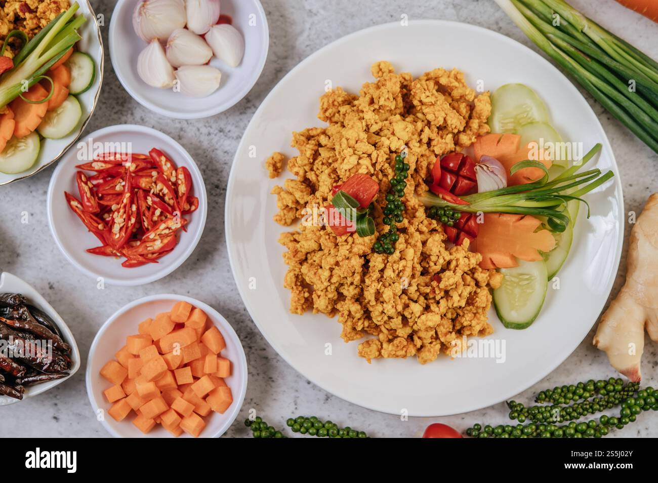 Fried Chicken Pop with Chili Scallions and tomatoes Stock Photo - Alamy