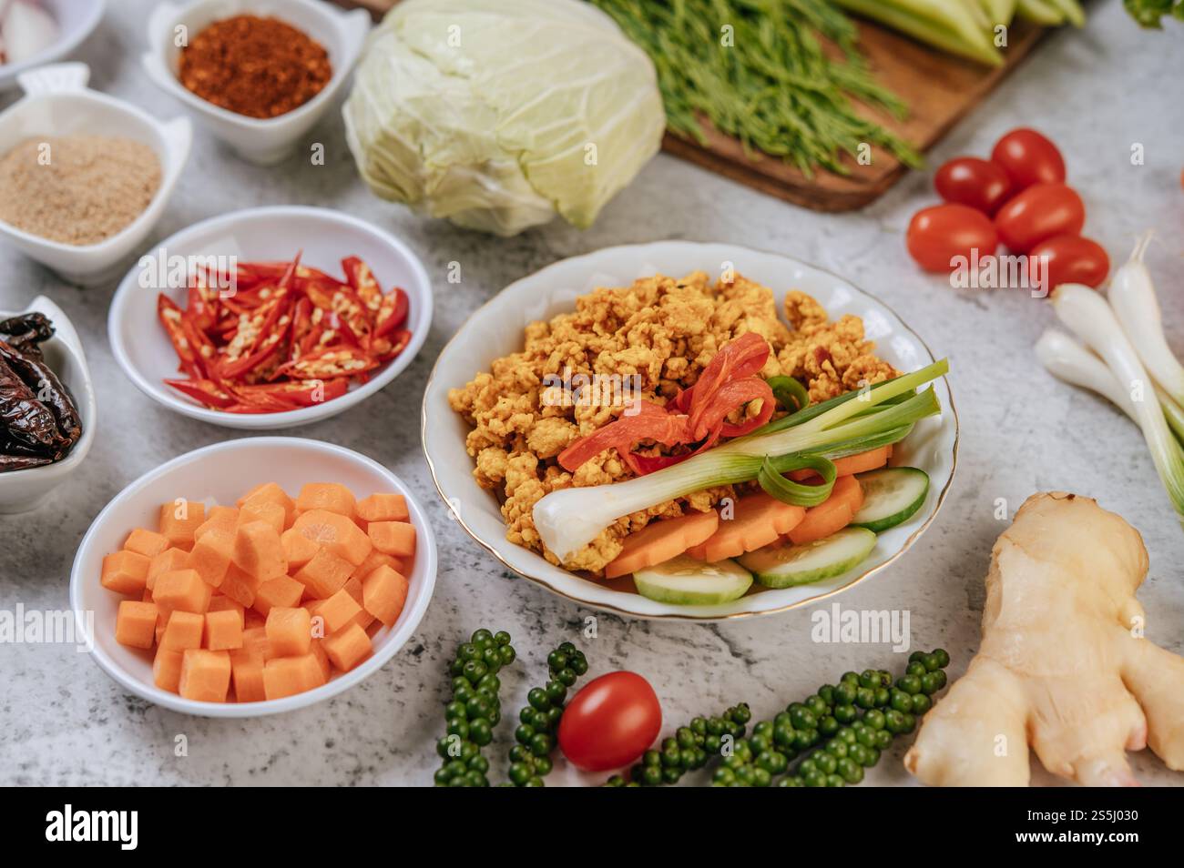 Fried Chicken Pop with Chili Scallions and tomatoes Stock Photo - Alamy