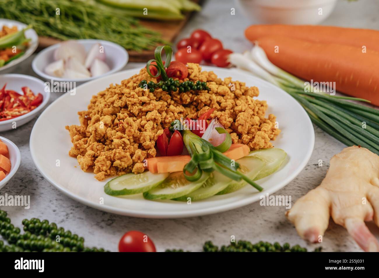 Fried Chicken Pop with Chili Scallions and tomatoes Stock Photo - Alamy