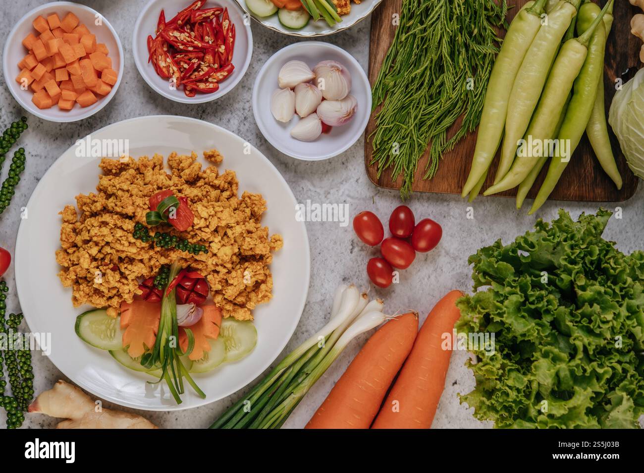 Fried Chicken Pop with Chili Scallions and tomatoes Stock Photo - Alamy