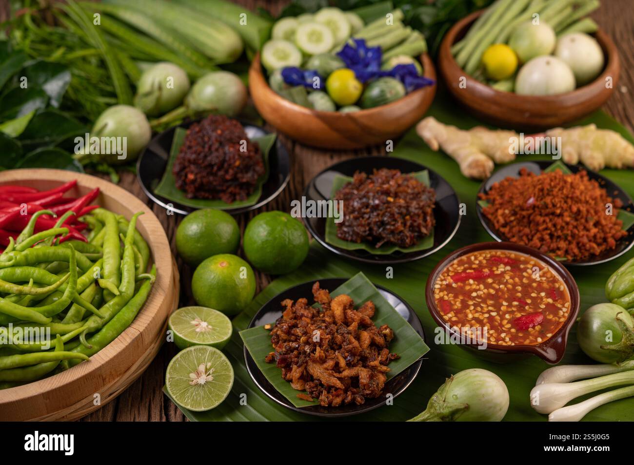 Different types of chili sauce in a cup with ingredients to make Stock ...