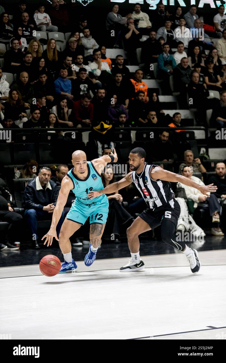#12 Andrew Andrews is driving the ball and #5 Derek Needham is the ...