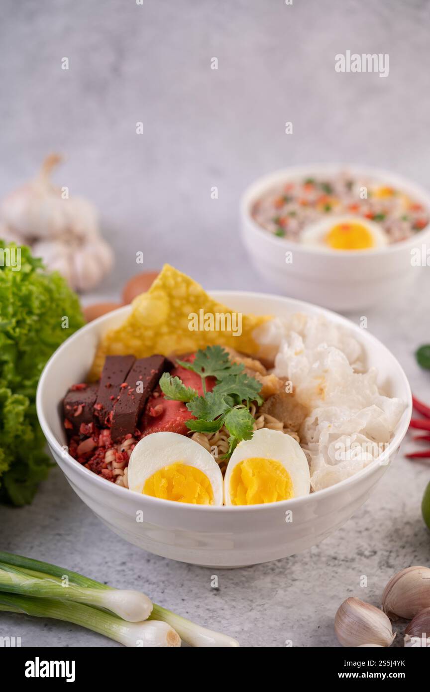 Yentafo with boiled egg, spring onion, chili, lime and garlic Stock ...