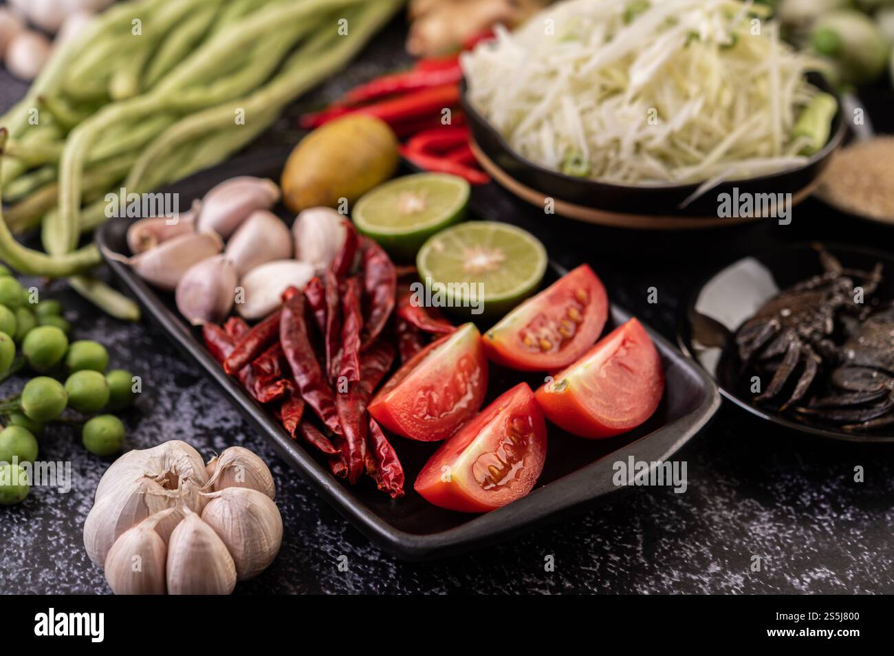 Papaya salad ingredients include papaya, pickled crab, eggplant, tomato ...