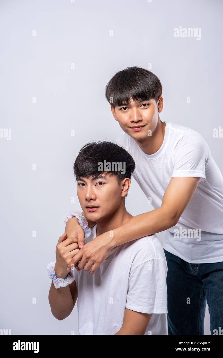 Another man behind young hi-res stock photography and images - Alamy