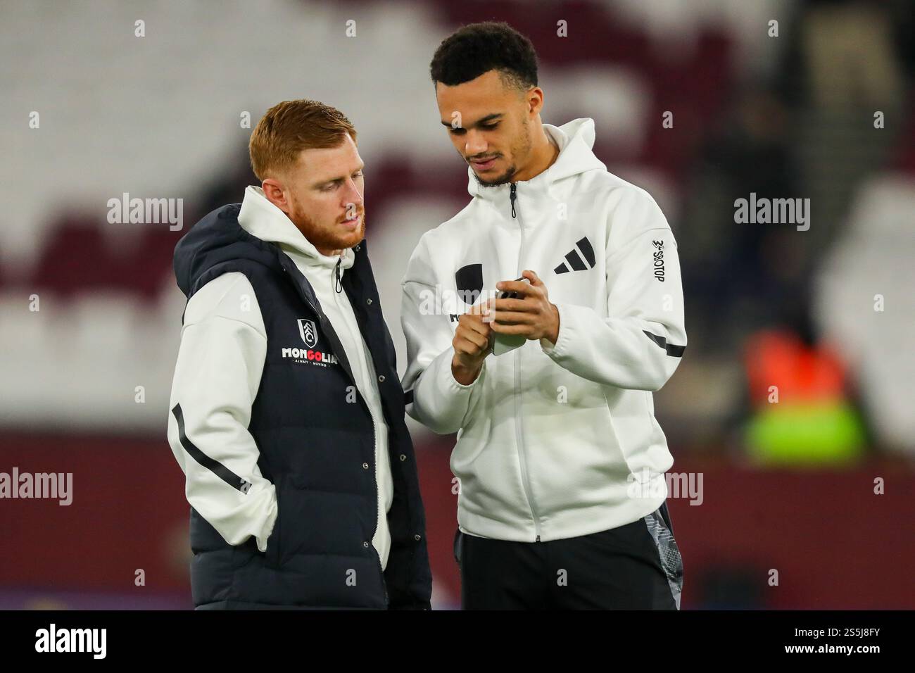 London, UK. 14th Jan, 2025. Harrison Reed and Antonee Robinson of ...