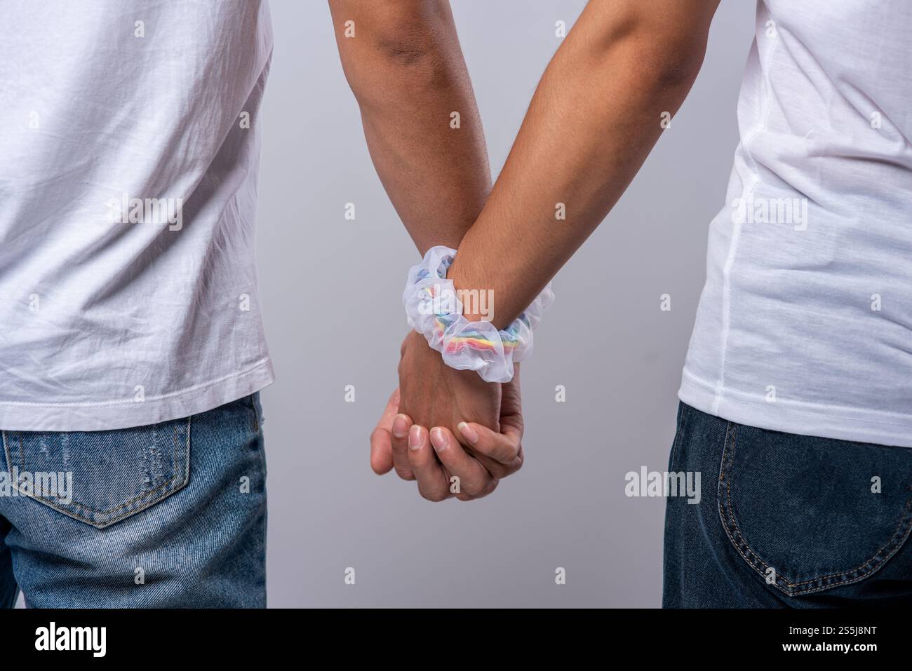 Two men who love each other stand hand in hand Stock Photo - Alamy