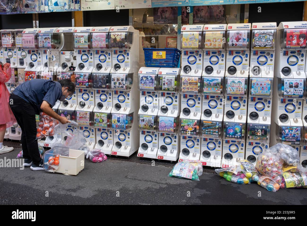 Worker Refilling Gachapon Capsule Station in Kyoto Japan Stock Photo ...