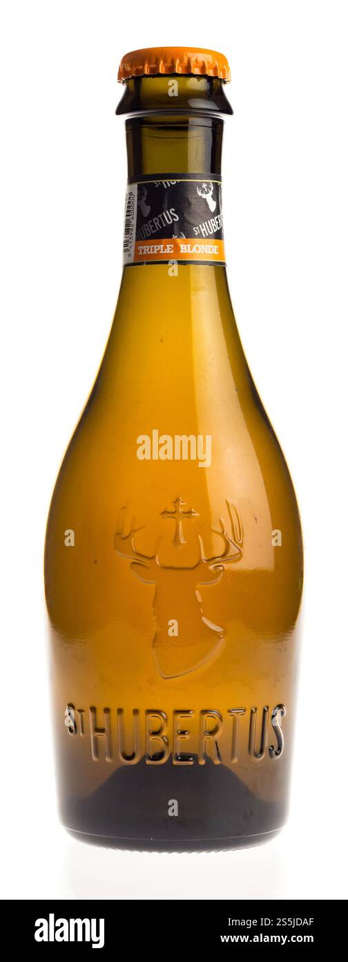 Bottle of Belgian St. Hubertus Triple Blonde beer isolated on white ...
