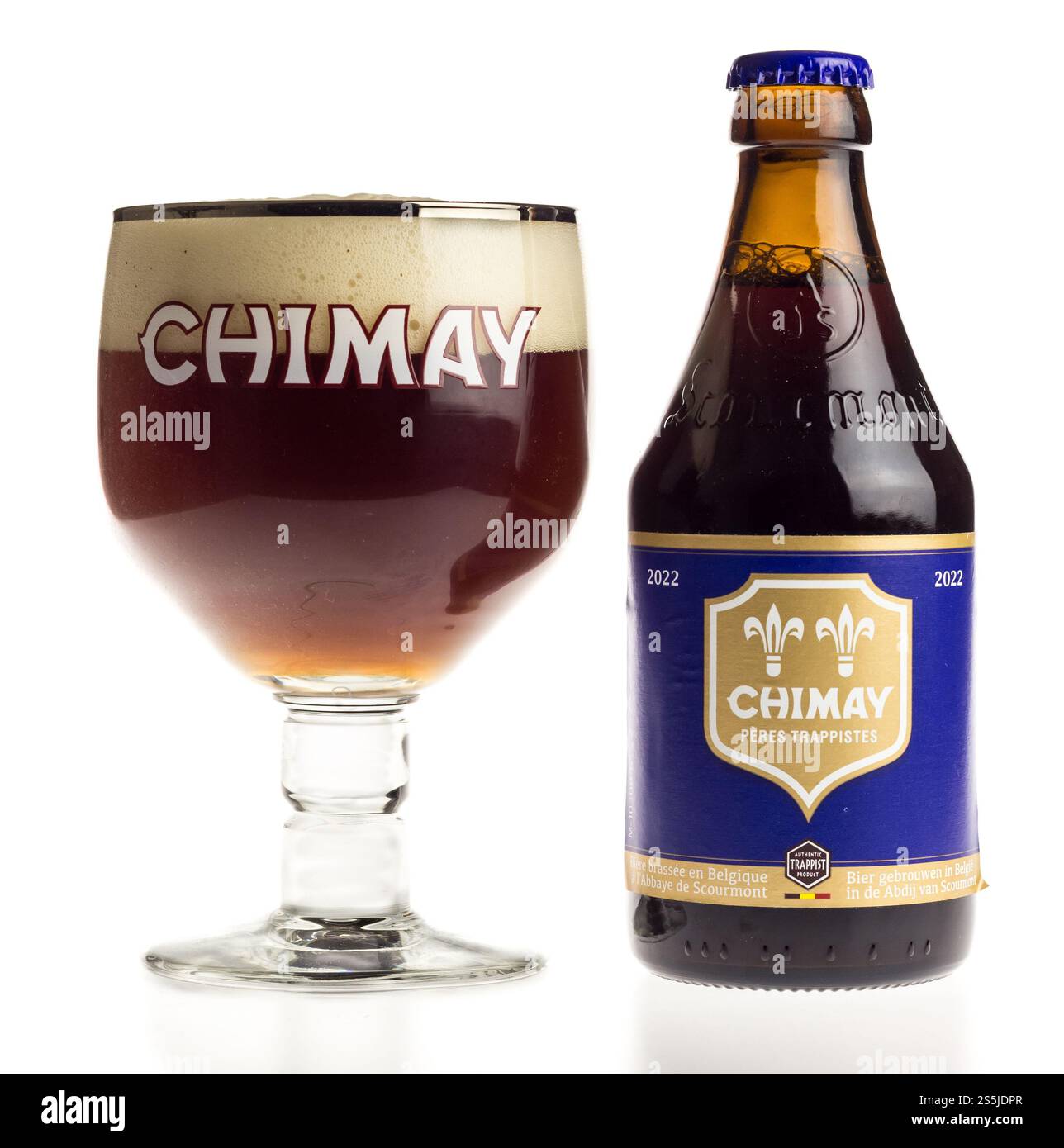 Bottle and glass of Belgian Chimay Blue beer isolated on white ...
