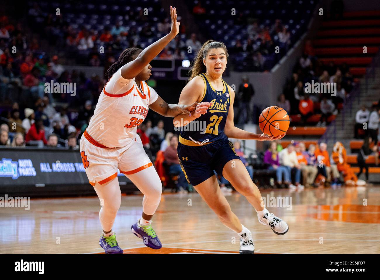 Notre Dame forward Maddy Westbeld (21) drives on Clemson forward Raven ...