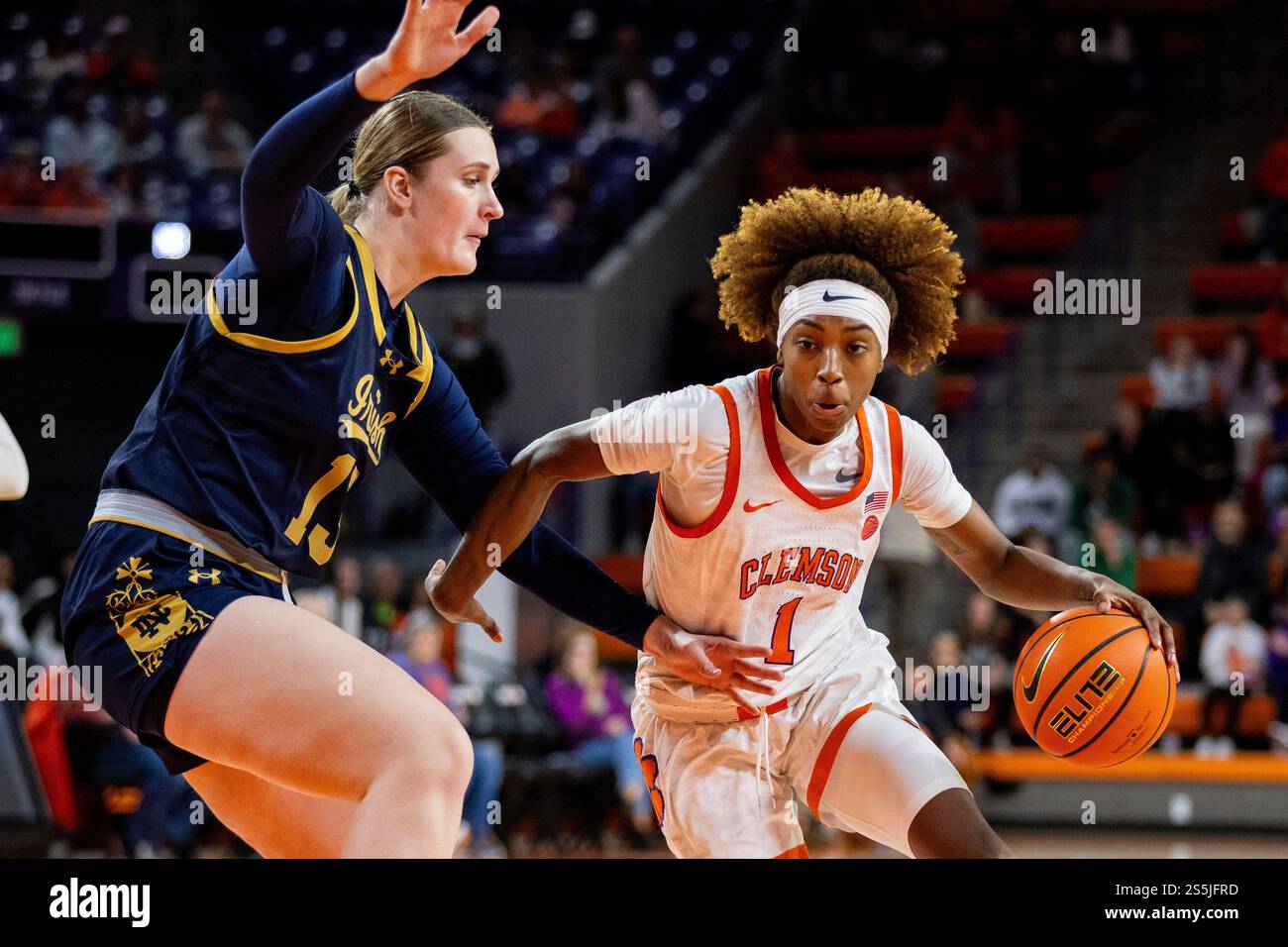 Clemson guard Loyal McQueen (1) drives on Notre Dame forward Kate Koval ...