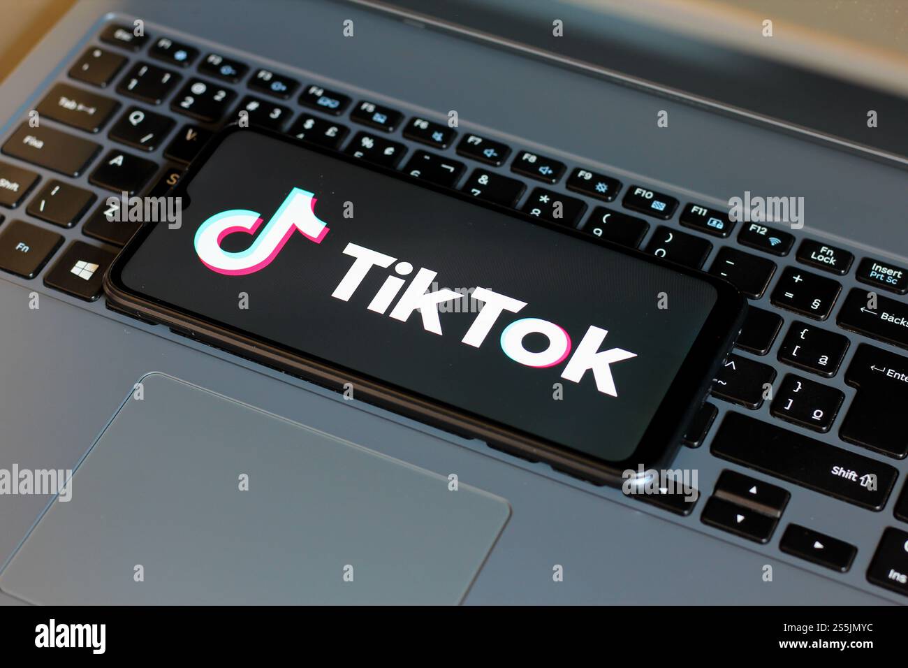 In this photo illustration, the TikTok logo is seen displayed on a ...