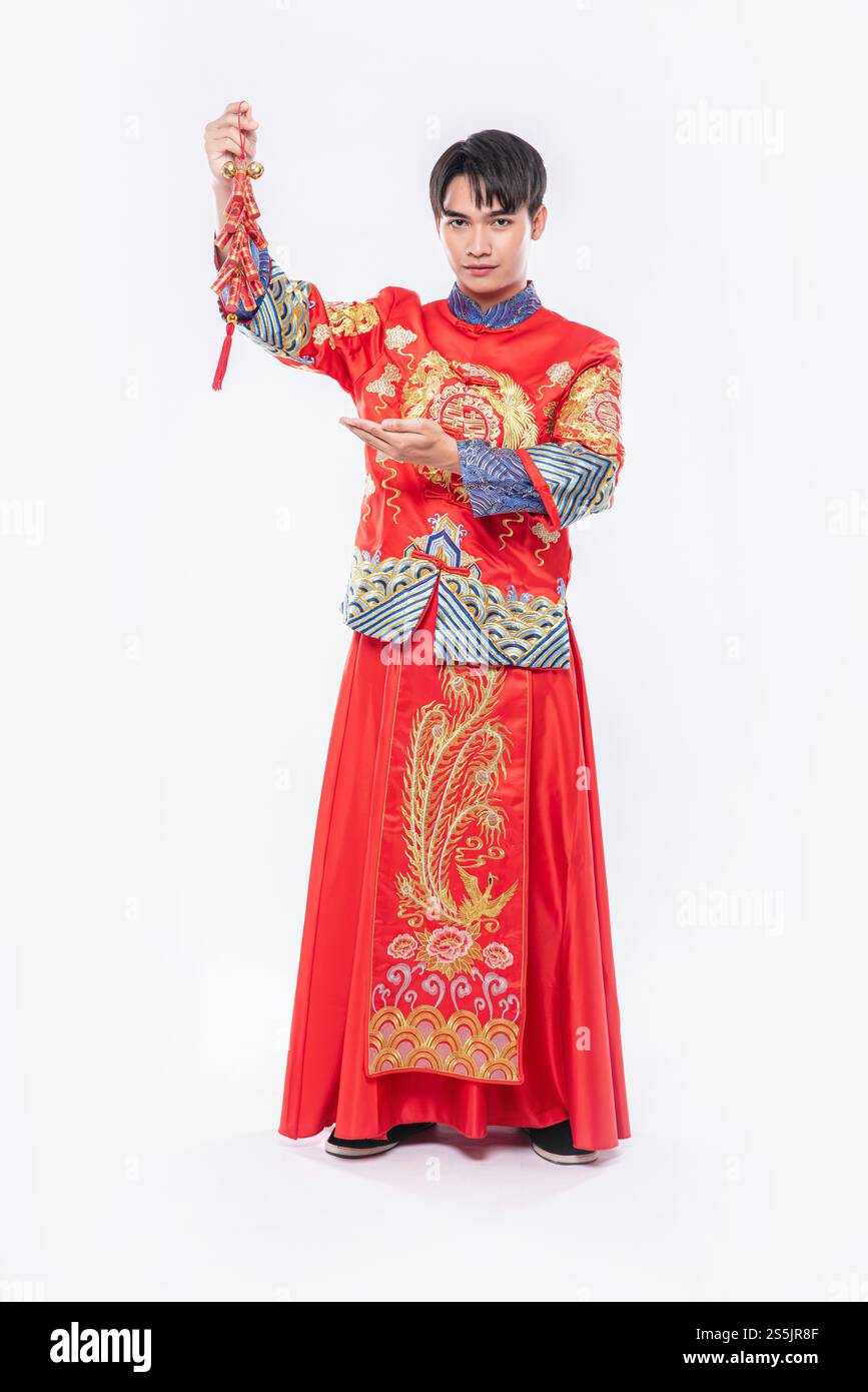 Man wear Cheongsam smile to get Firecrackers from boss in chinese new ...