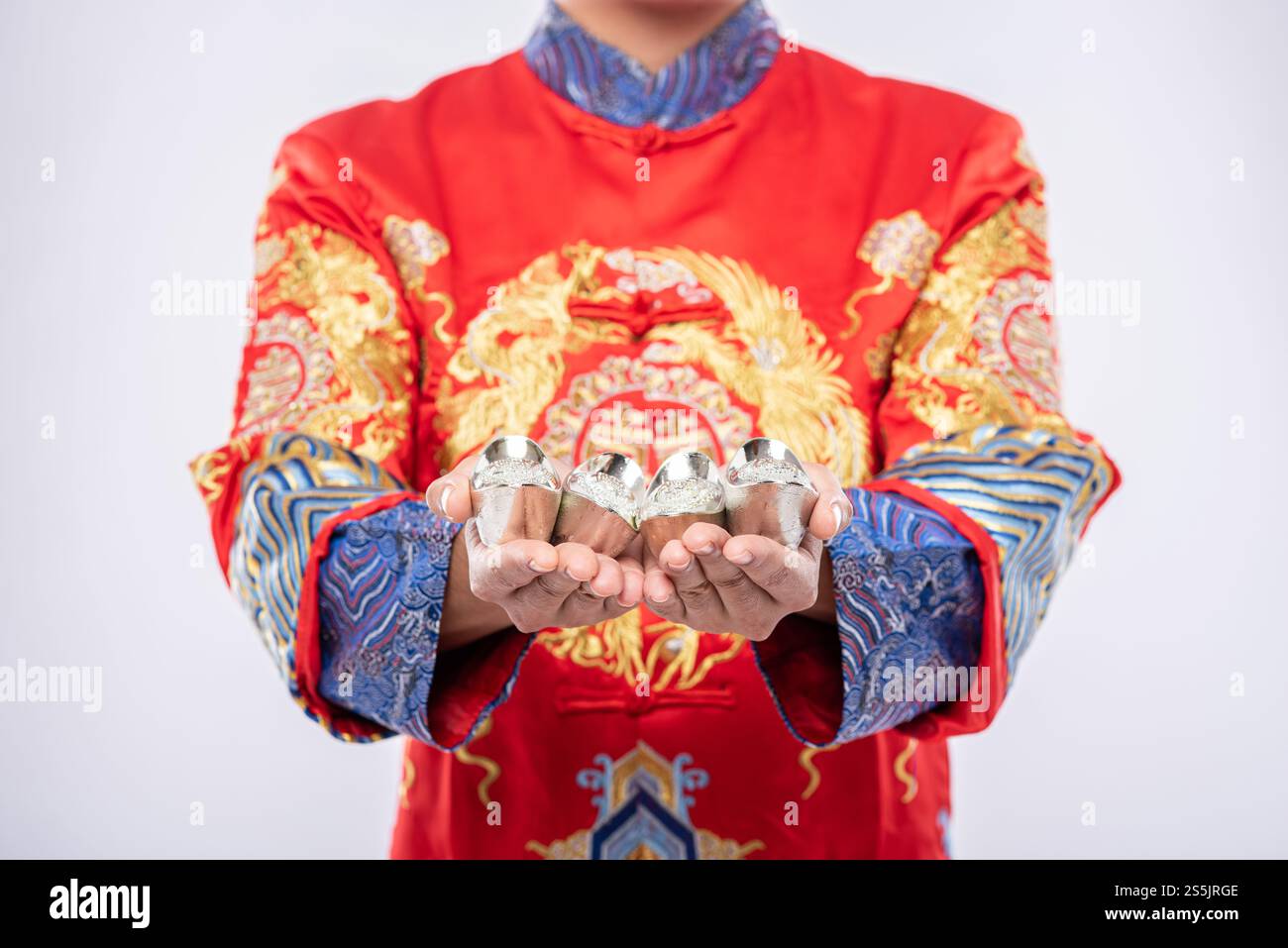 Man wear Cheongsam suit smile and standing to give the gift money to ...