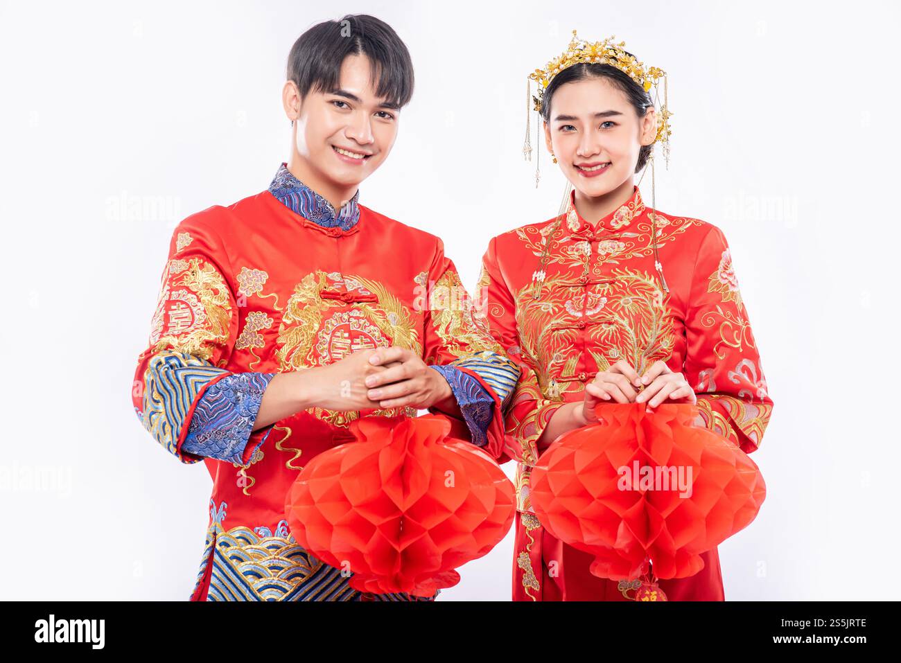 Men and women wearing qipao standing with Honeycomb lamp, Isolated on ...