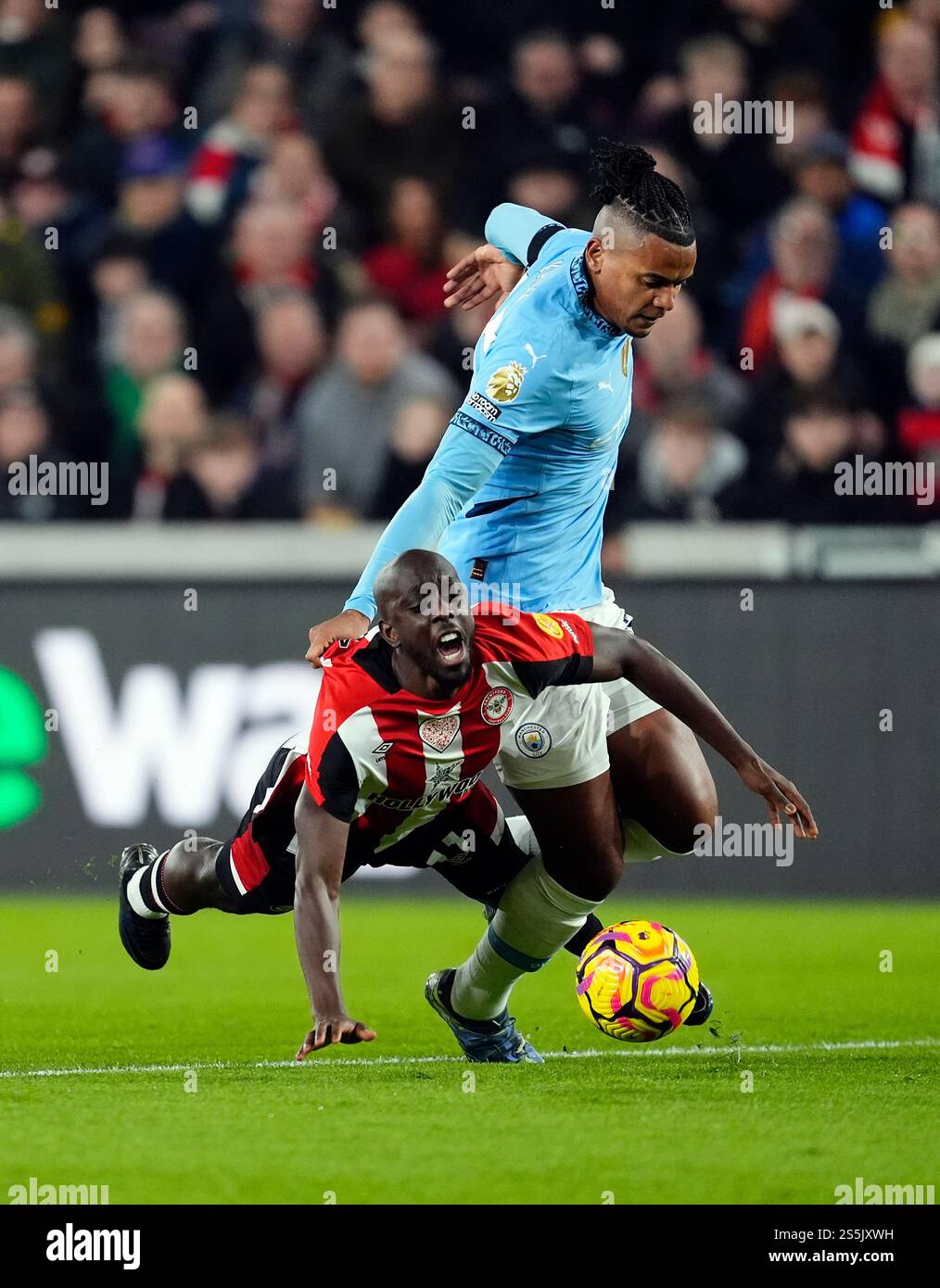 Brentford's Yoane Wissa and Manchester City's Manuel Akanji (right ...