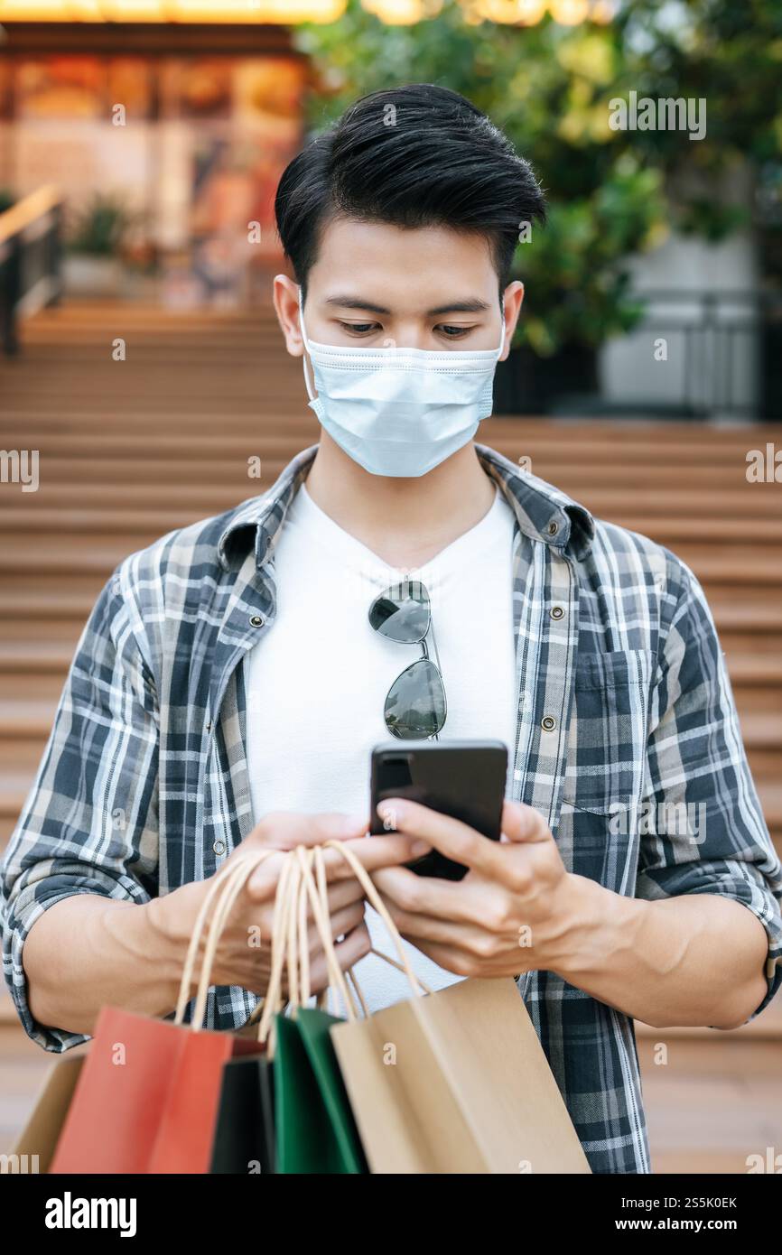 Young man smartphone in new hi-res stock photography and images - Alamy