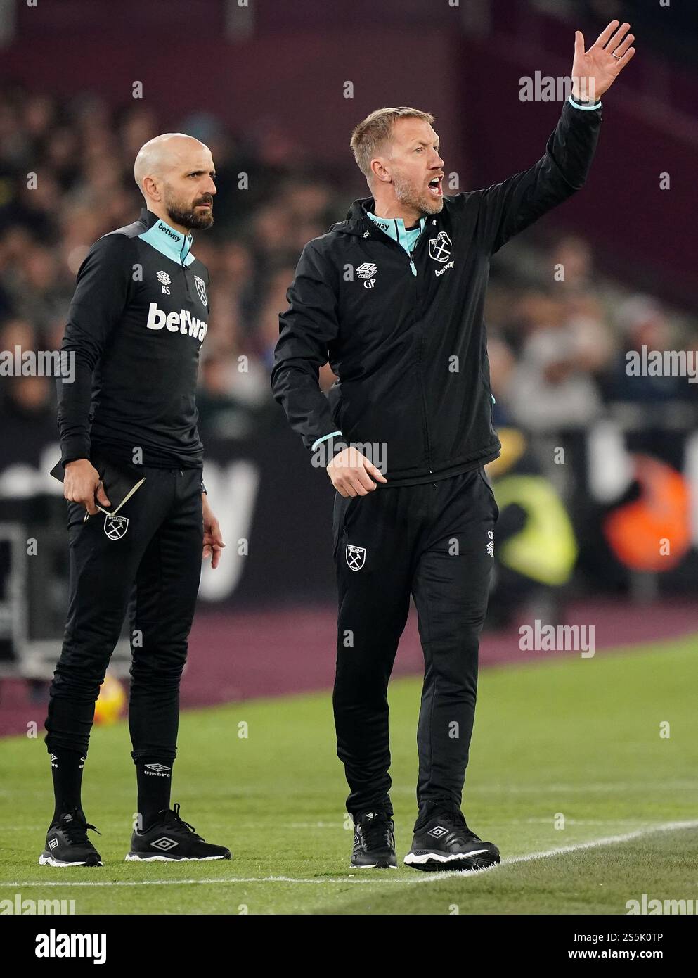 West Ham United manager Graham Potter (right) and assistant manager ...