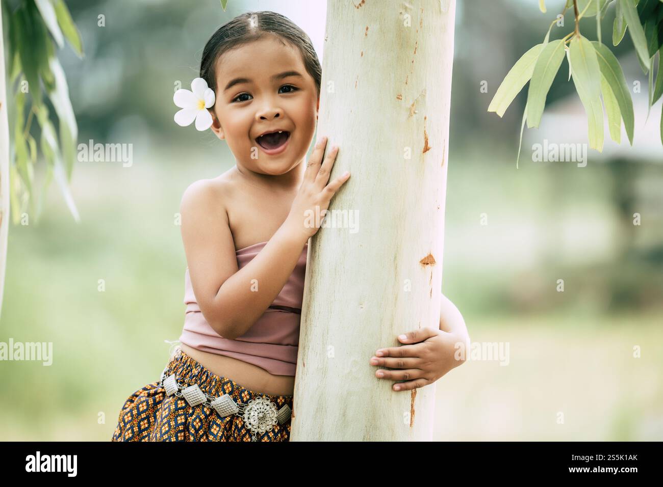 Close up, Portrait of little girl in Thai traditional dress and put ...