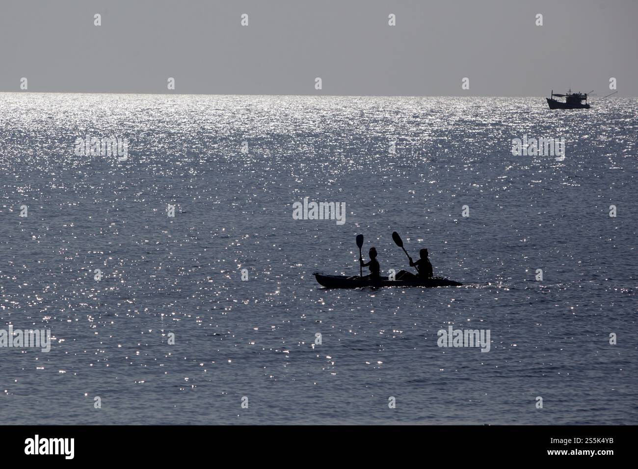 people paddle with a conoe Bay, Beach and Landscape at the Town of ...