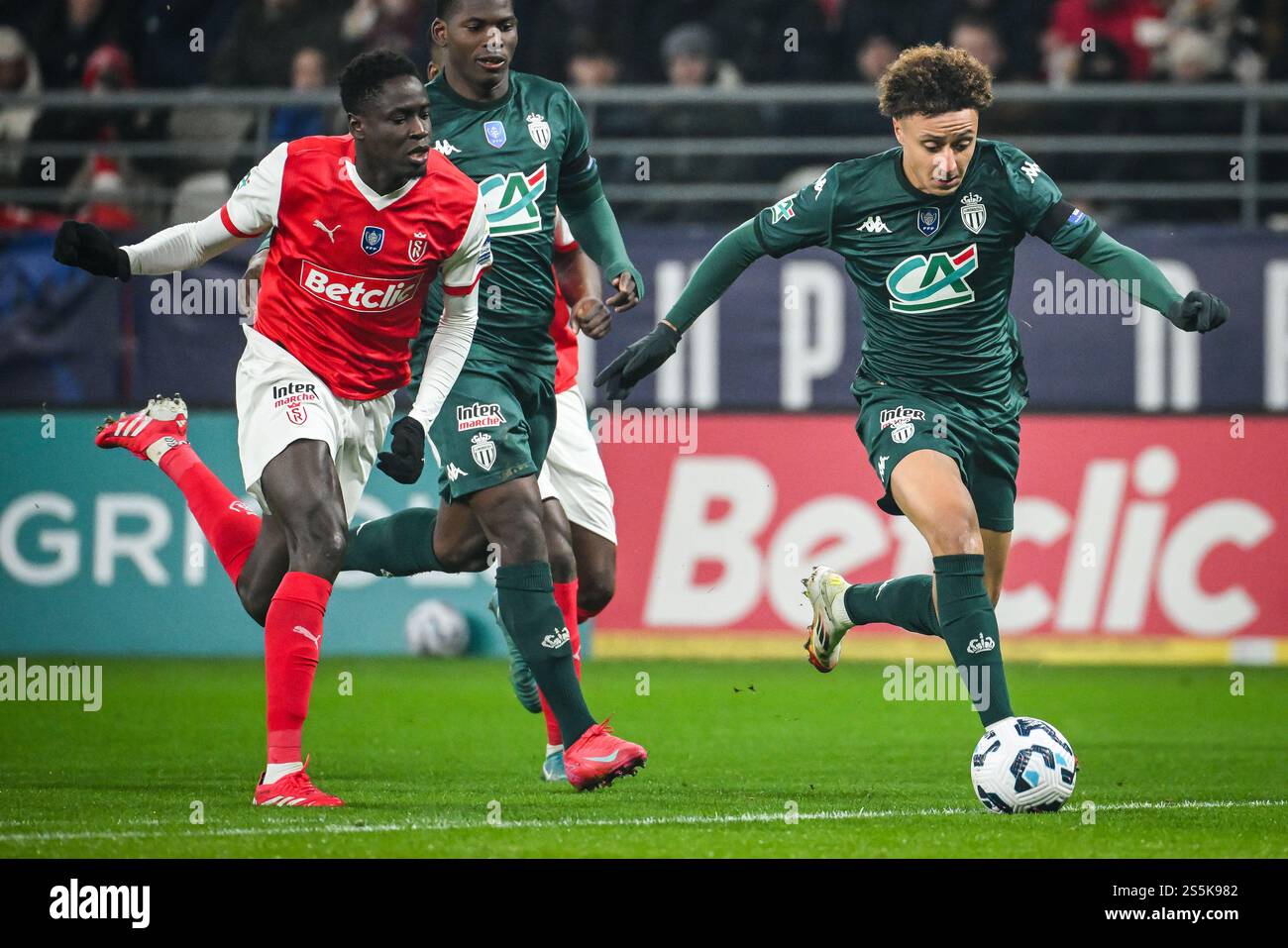 Reims, France. 14th Jan, 2025. Joseph OKUMU of Reims and Eliesse BEN ...