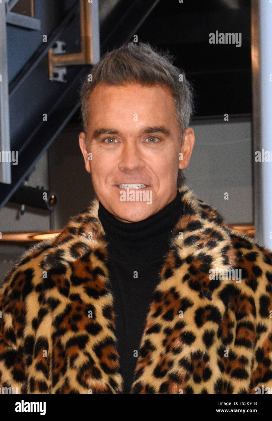 NEW YORK, NY- JANUARY 14: Robbie Williams visits the Empire State ...