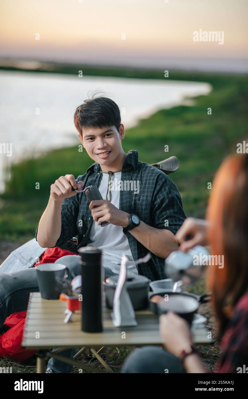 Cheerful handsome man talking hi-res stock photography and images - Alamy