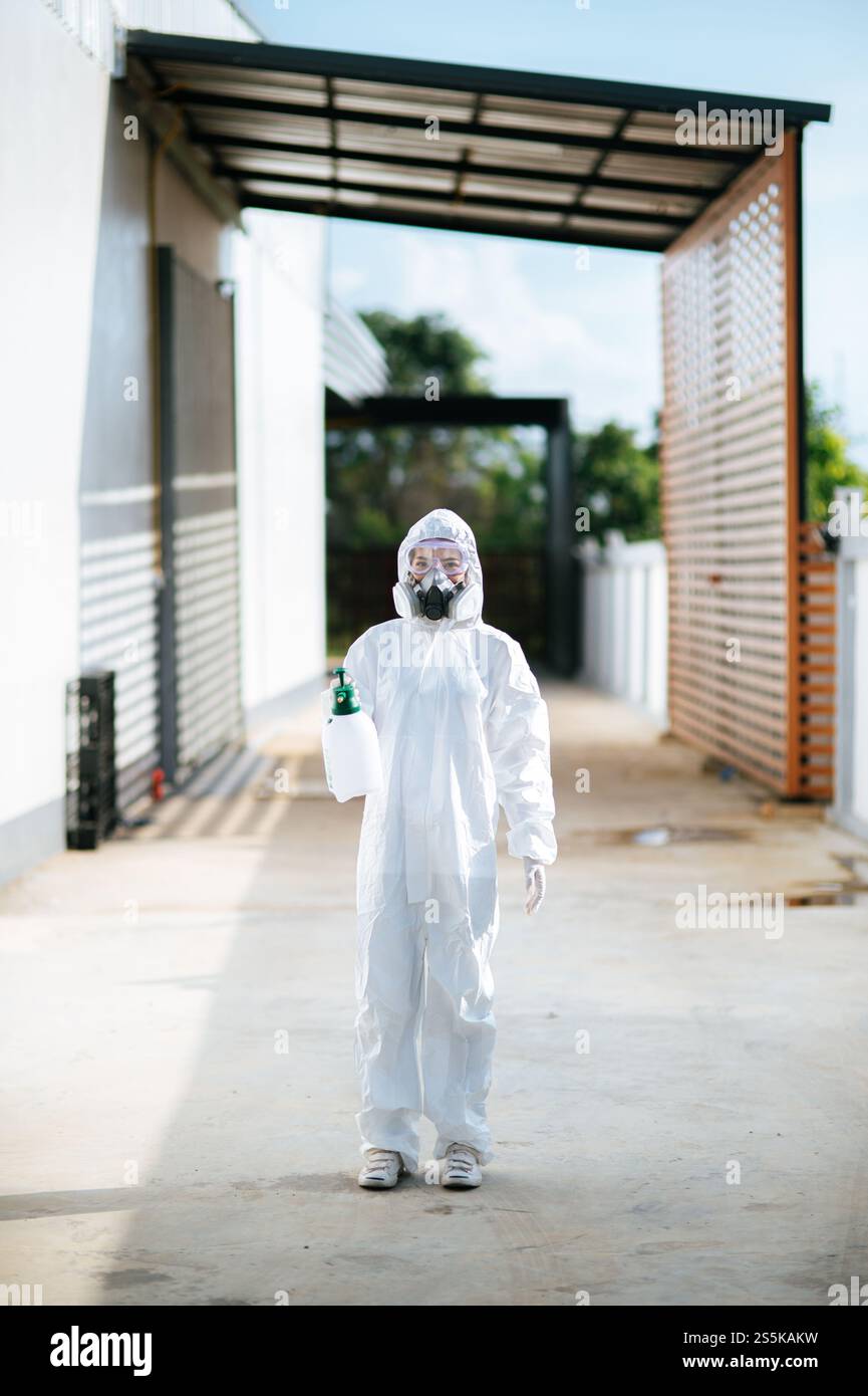 Disinfection specialist woman in personal protective equipment (ppe ...