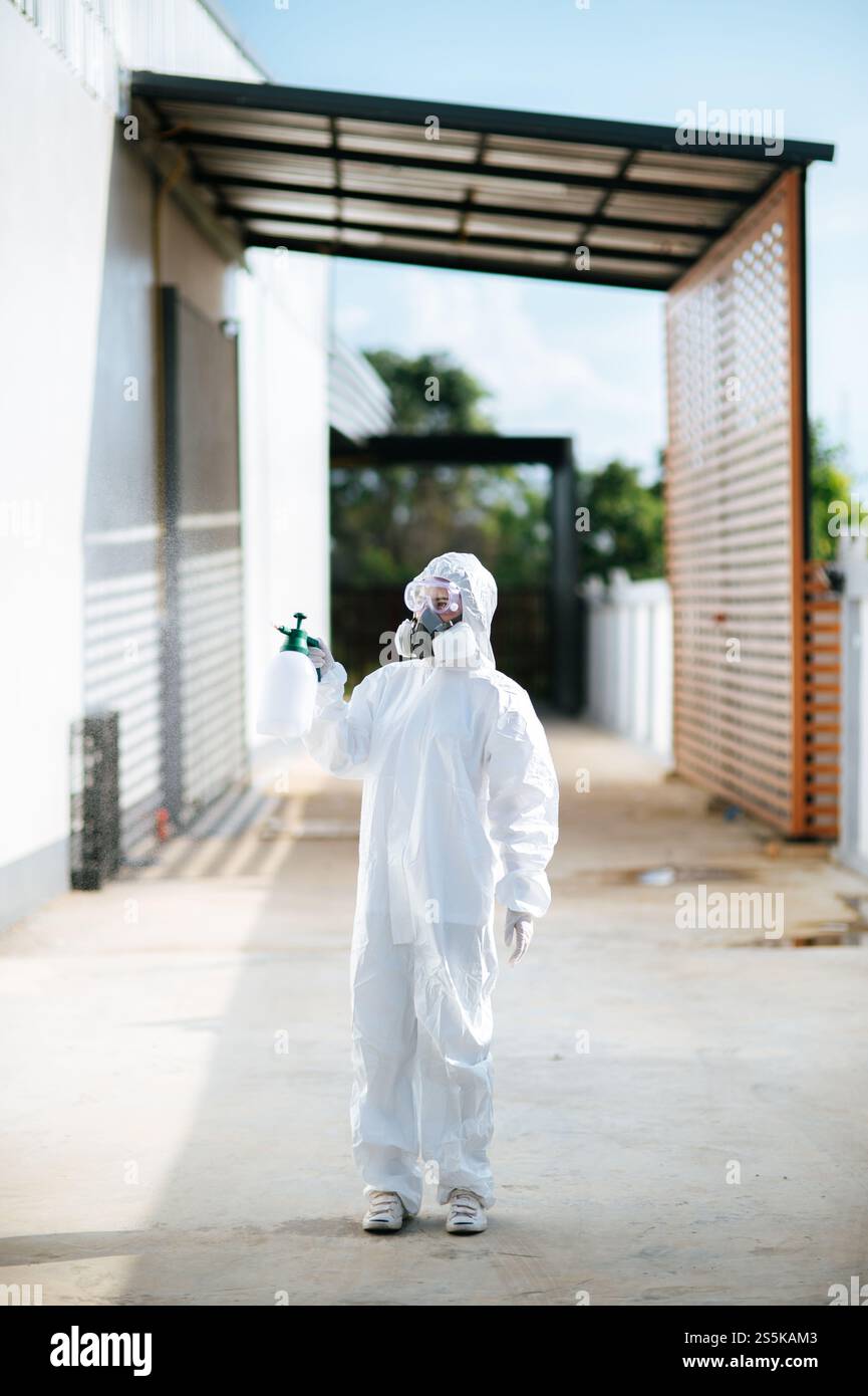 Disinfection specialist woman in personal protective equipment (ppe ...