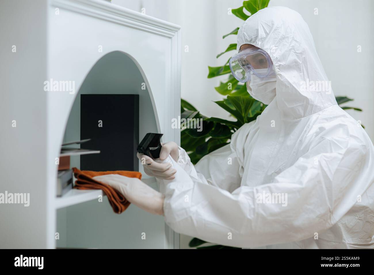 Disinfection specialist staff in personal protective equipment (ppe ...