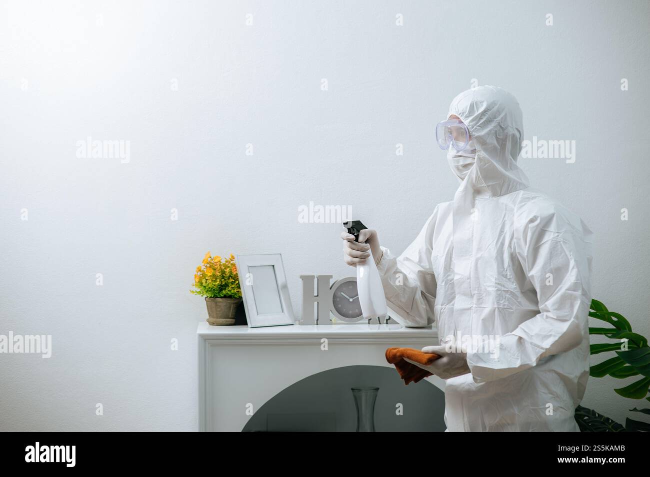 Disinfection specialist staff in personal protective equipment (ppe ...