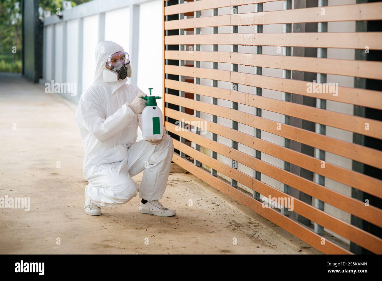 Disinfection specialist staff in personal protective equipment (ppe ...