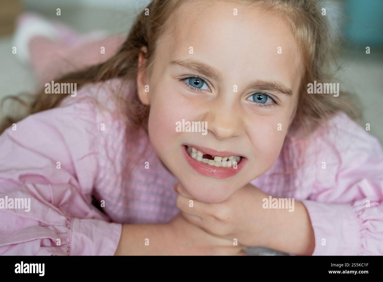 Child lost teeth. Portrait of little girl without teeth. Home Stock ...