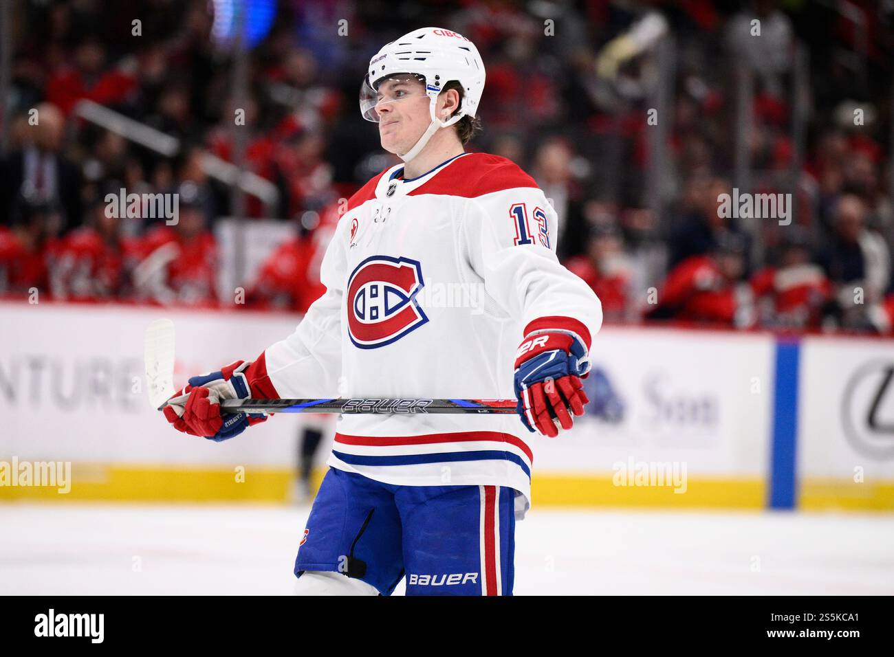 Montreal Canadiens right wing Cole Caufield (13) looks on during the ...