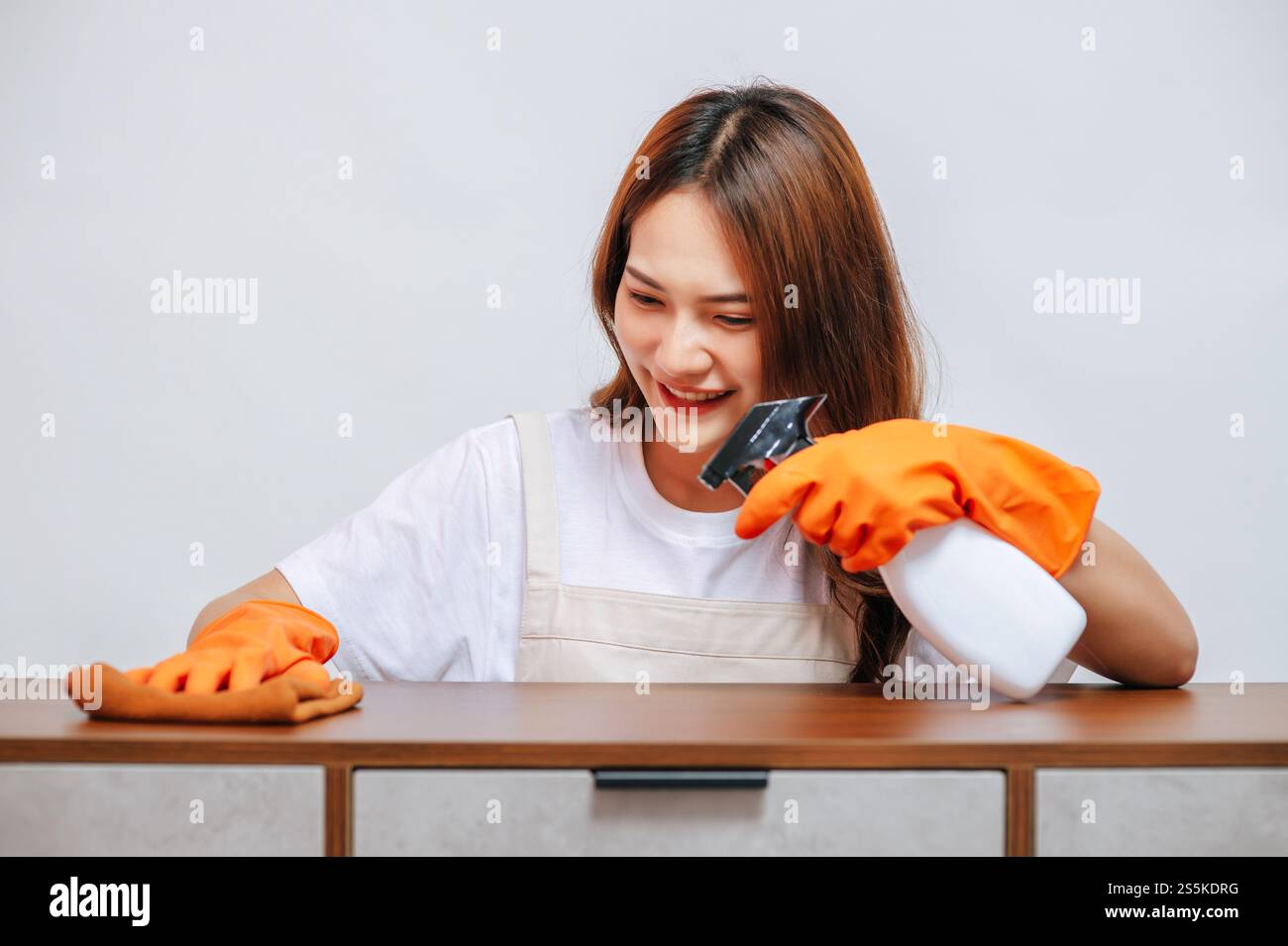 Portrait Asian young pretty woman was spray disinfectant bottle and ...