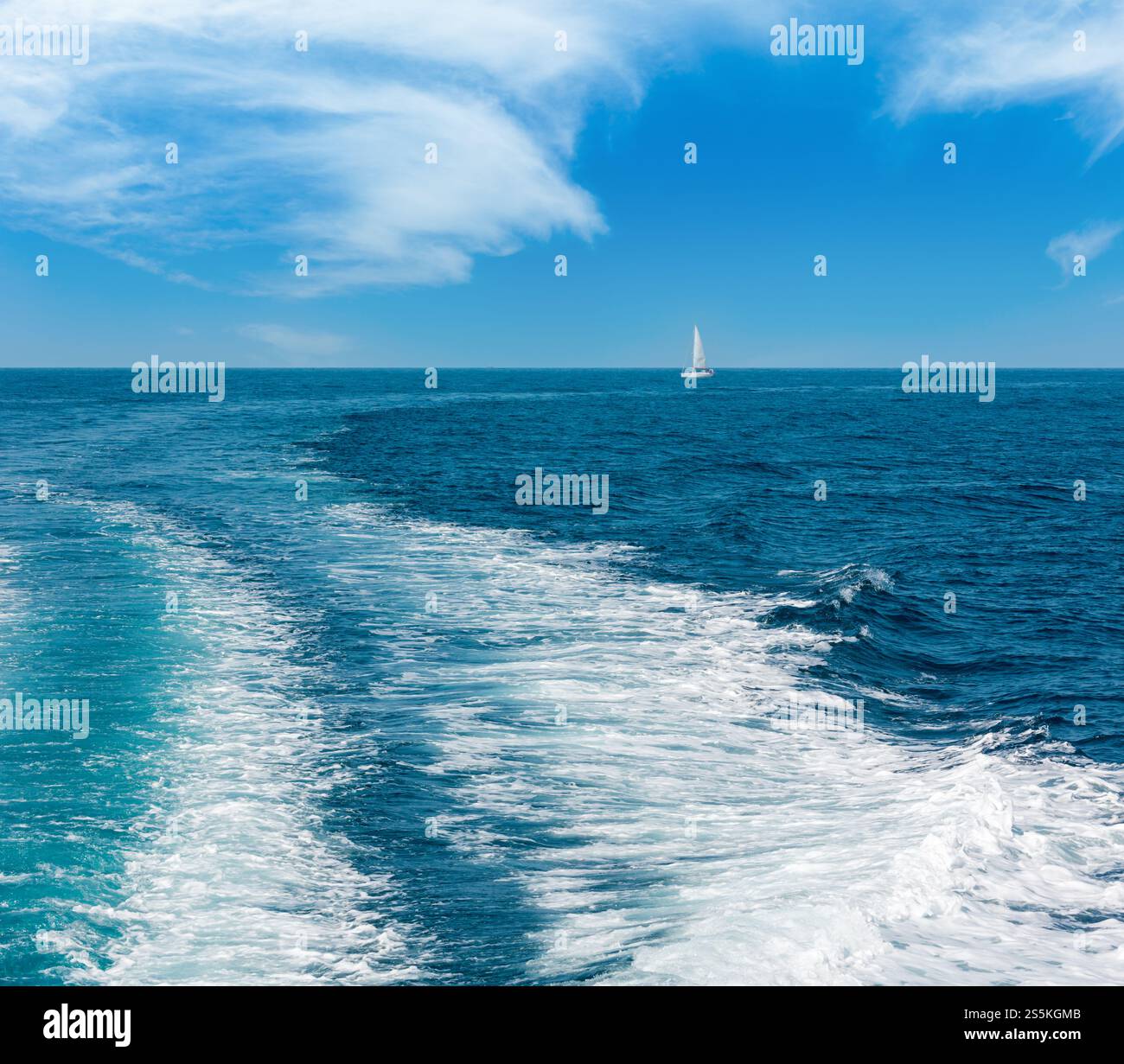 Trace tail of speed boat or ferry on water surface in the sea and white ...
