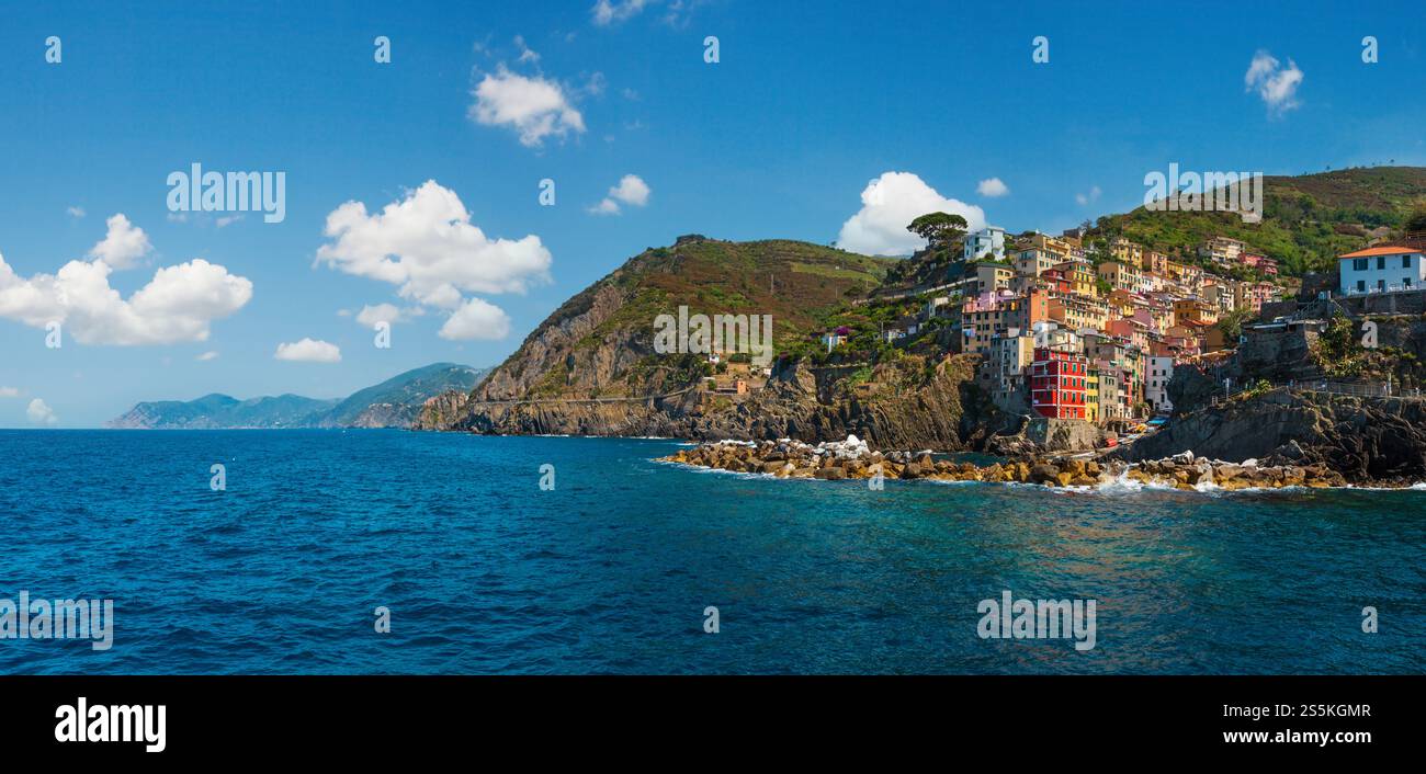 Beautiful summer Manarola coast view from excursion ship. One of five ...