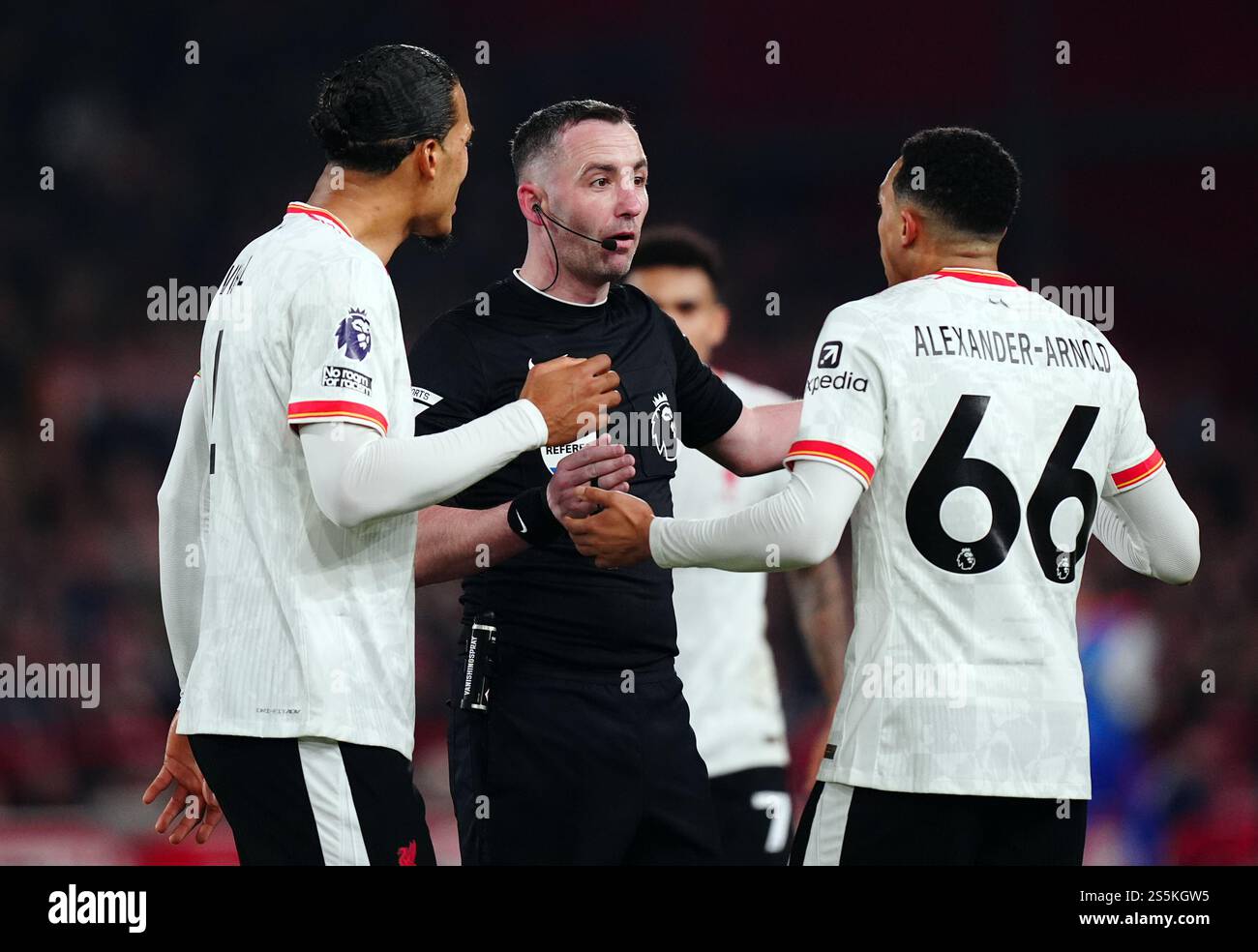 Referee Chris Kavanagh with Liverpool's Virgil van Dijk and Trent ...